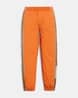 Buy Orange Track Pants for Men by Coach Online | Ajio.com