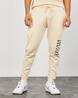 Buy Cream Track Pants for Men by Styli Online | Ajio.com