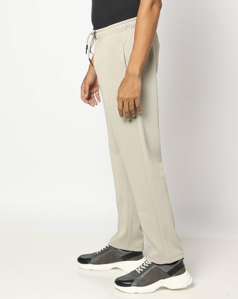 Buy Beige Track Pants for Men by YOUSTA Online | Ajio.com