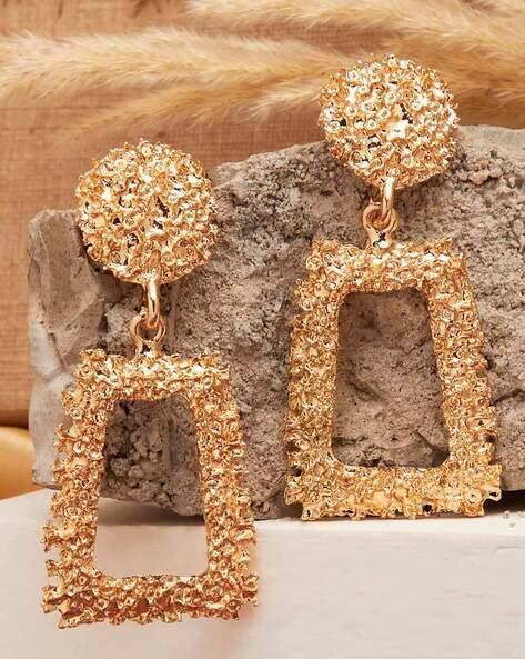 Brass stud earrings store