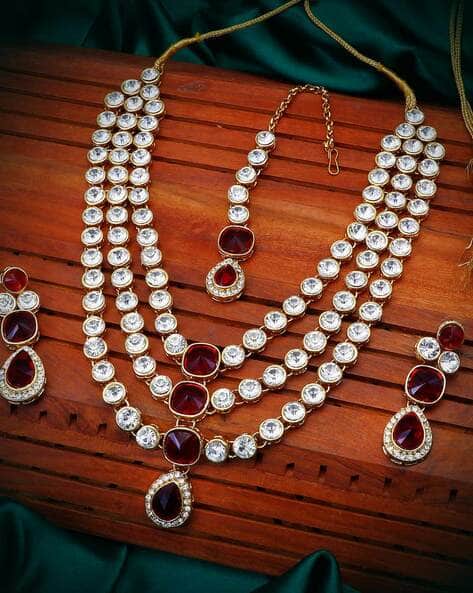 Sukkhi Modish Gold Plated Kundan Multi String Jewellery Set