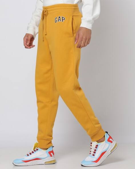 Buy Yellow Track Pants for Men by GAP Online | Ajio.com