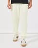 Buy Cream Track Pants for Men by Styli Online | Ajio.com