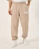 Buy Beige Track Pants for Men by Styli Online | Ajio.com