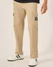 Buy Cream Track Pants for Men by Styli Online | Ajio.com