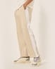 Buy Cream Track Pants for Men by Styli Online | Ajio.com