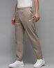 Buy Beige Track Pants for Men by Reebok Online | Ajio.com